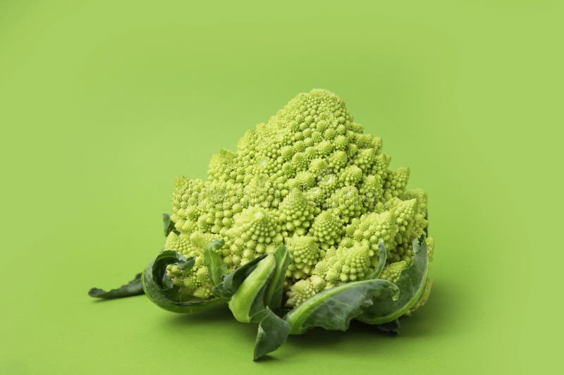 Fresh Raw Romanesco Broccoli on Green Background Stock Photo - Image of ...