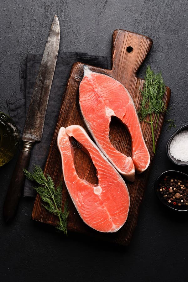 Fresh Raw Salmon Steak. Two Fish Steaks and Spices Stock Photo - Image ...