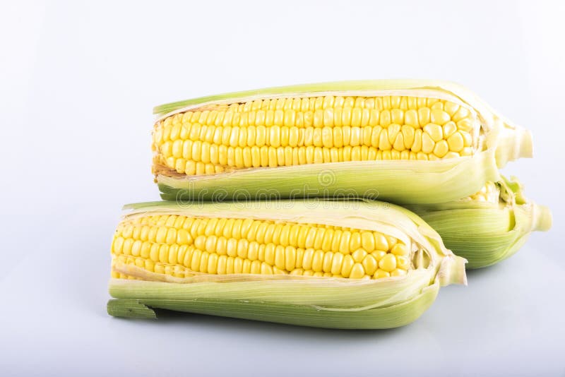 Fresh Raw Sweet Corn on the Cob Kernels Over White Background Stock ...