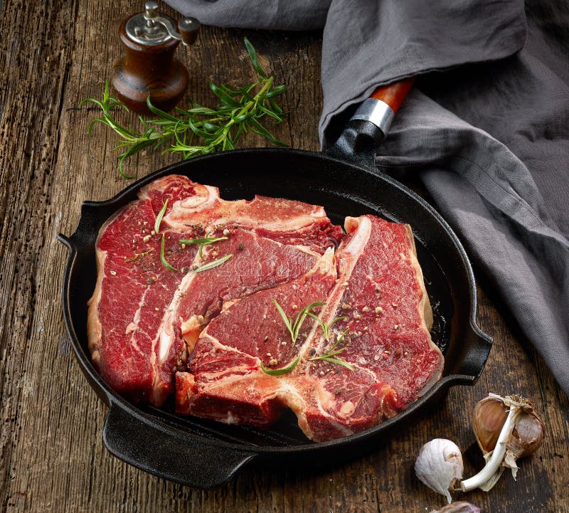 Fresh raw T bone steaks stock image. Image of dinner - 105818203