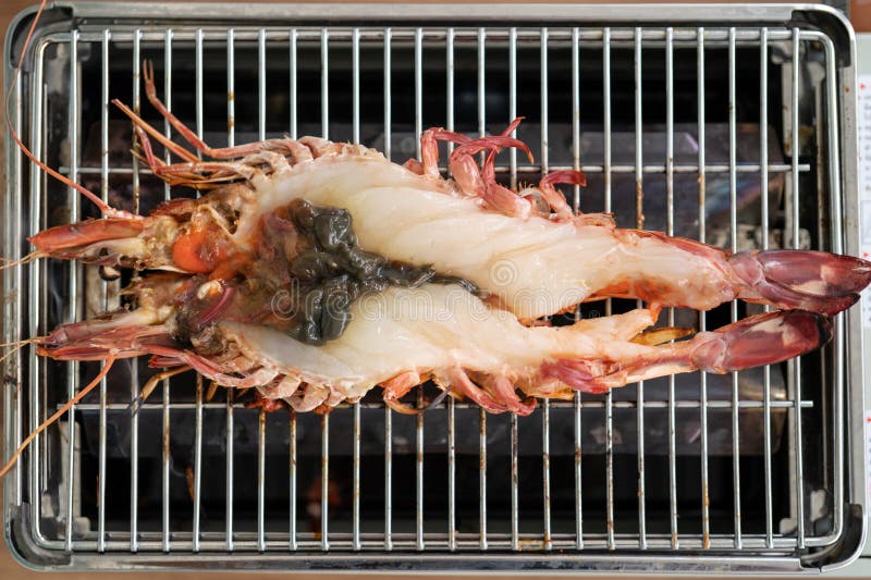 Fresh Raw Tiger Prawn Cut in Half on Gas BBQ Grill Roaster Stock Photo ...