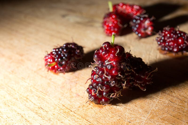 Fresh Red Berry on Wood Plate Stock Image - Image of berry, isolated ...