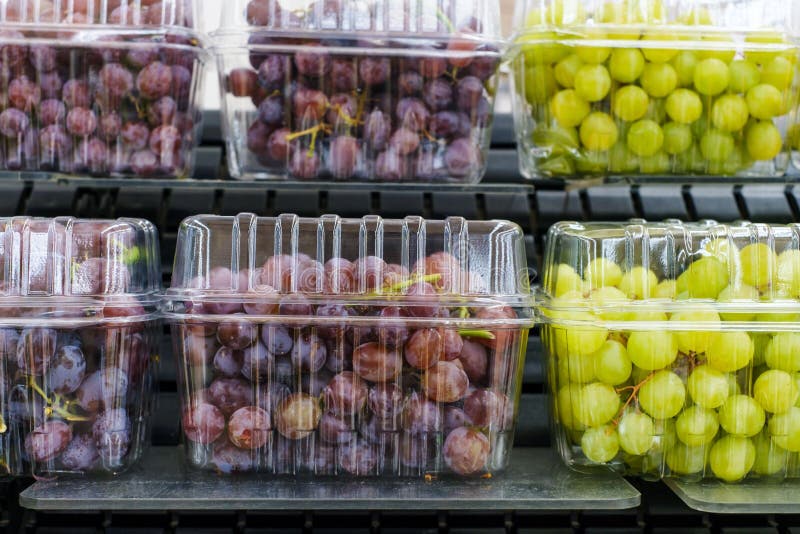 Fresh Red and Green Grapes in Plastic Box in Supermarket Close-up ...