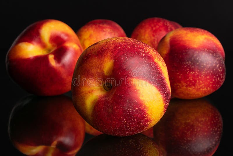 Fresh Red Nectarine Isolated on Black Glass Stock Photo - Image of ...