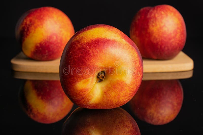 Fresh Red Nectarine Isolated on Black Glass Stock Image - Image of ...