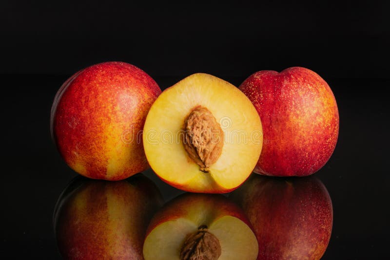 Fresh Red Nectarine Isolated on Black Glass Stock Image - Image of ...