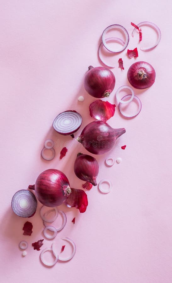 Fresh Red Onion on a Pink Background, Close-up, CopFresh Red Onion on ...