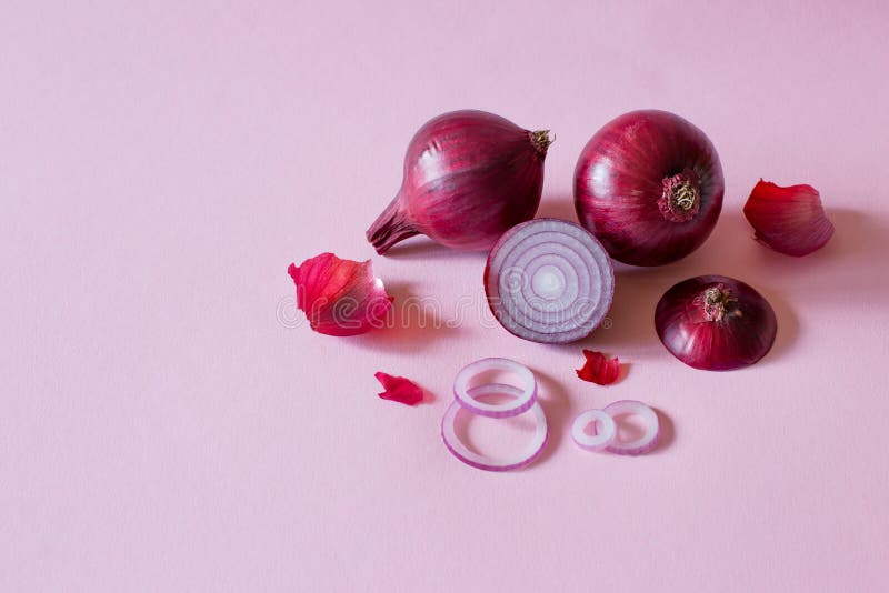 Red Onion on a Pink Background Stock Image - Image of healthy, objects ...