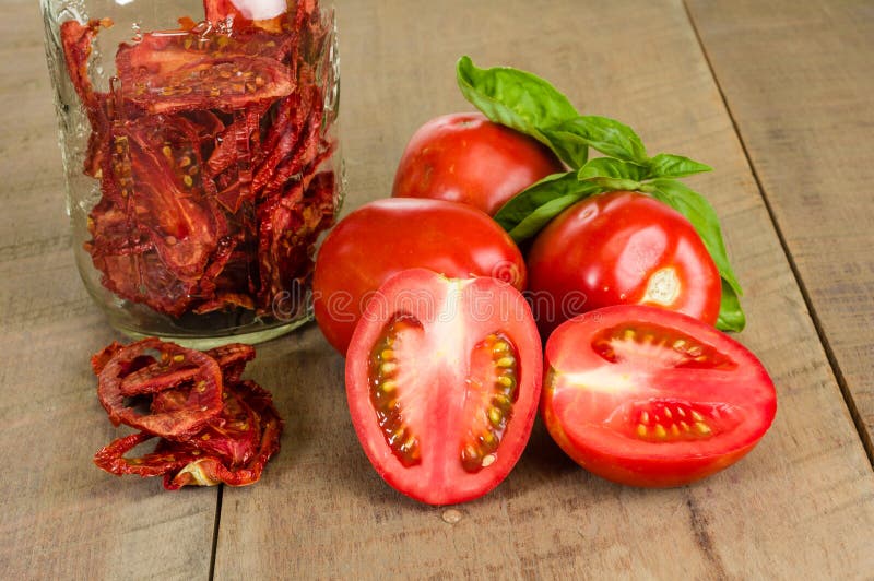 Fresh Red Paste Tomatoes with Basil and Jar Stock Image - Image of ...