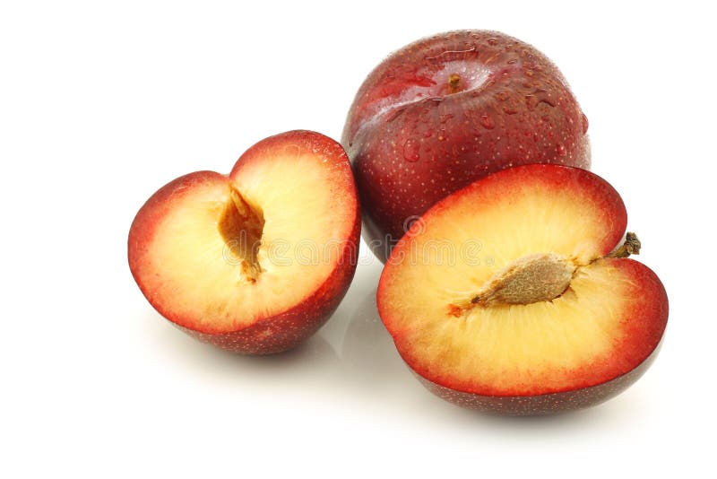 Fresh Red Plums and Some Pieces Stock Image - Image of droplets ...