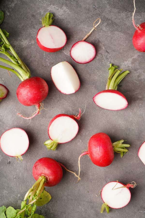 Fresh Red Radishes Slice with Leaves on Grey Background, Top View ...