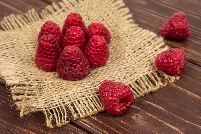 Fresh Red Raspberry on Brown Wood Stock Photo - Image of little, pink ...