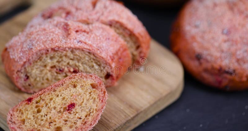 A Fresh Red Round Bun on the Table Stock Video - Video of addition ...