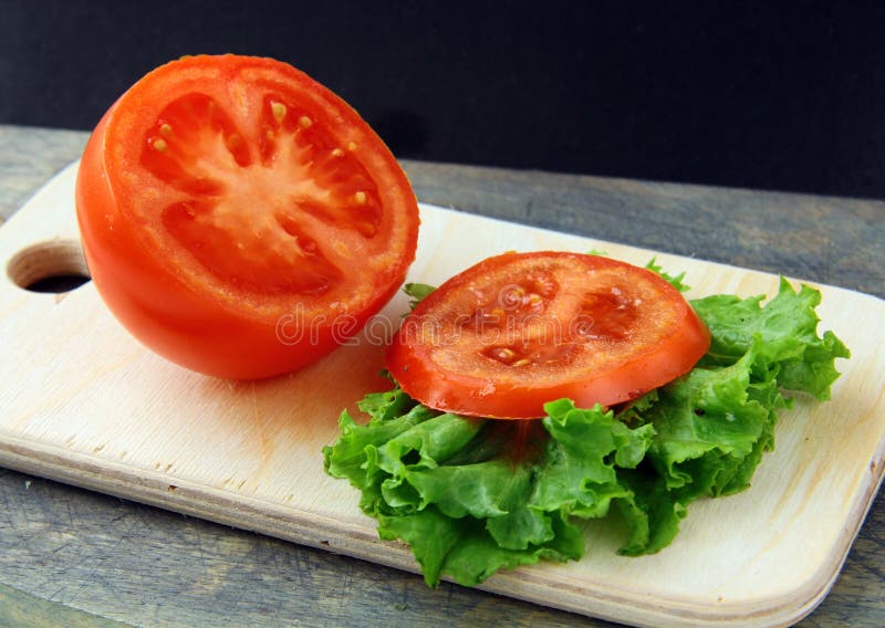 Fresh red sliced tomatoes stock photo. Image of homemade - 18119058