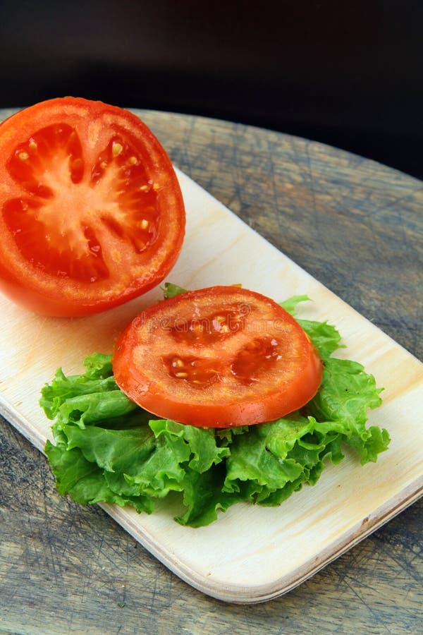Fresh red sliced tomatoes stock photo. Image of farm - 18240892