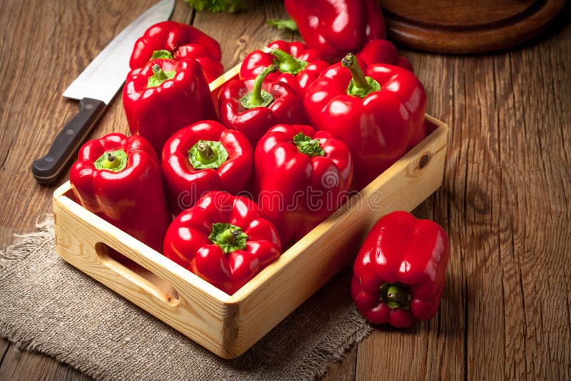 Fresh red sweet peppers. stock photo. Image of produce - 75813474