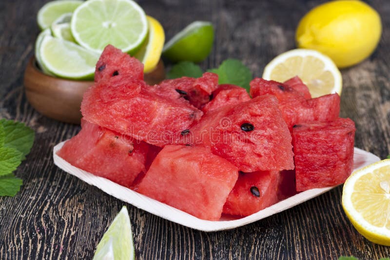 Fresh Red Watermelon Cut into Pieces Stock Photo - Image of lime ...