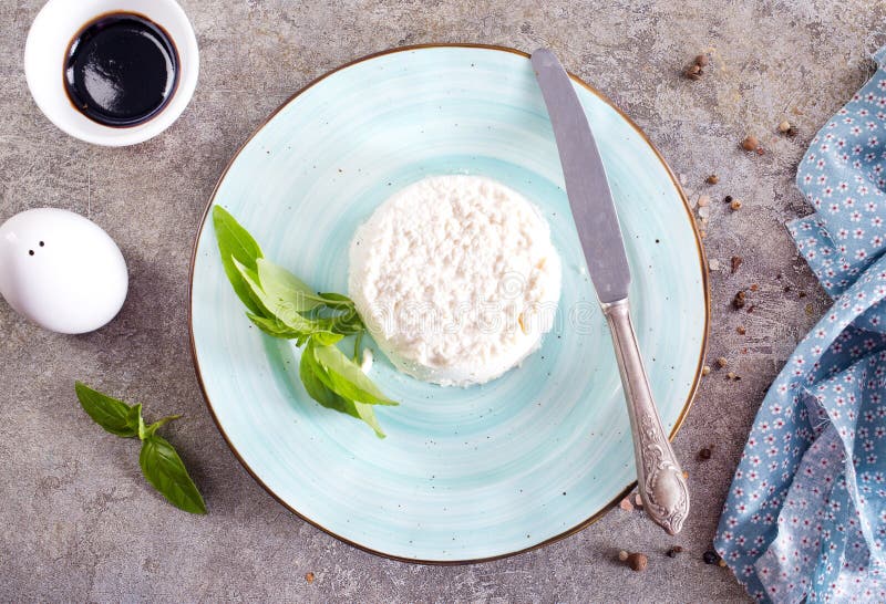 A Fresh Ricotta with Basil Leaf on Stone Table Stock Image - Image of ...