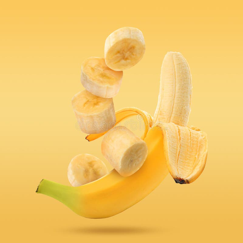 Fresh Ripe Bananas Falling on Golden Background Stock Image - Image of ...