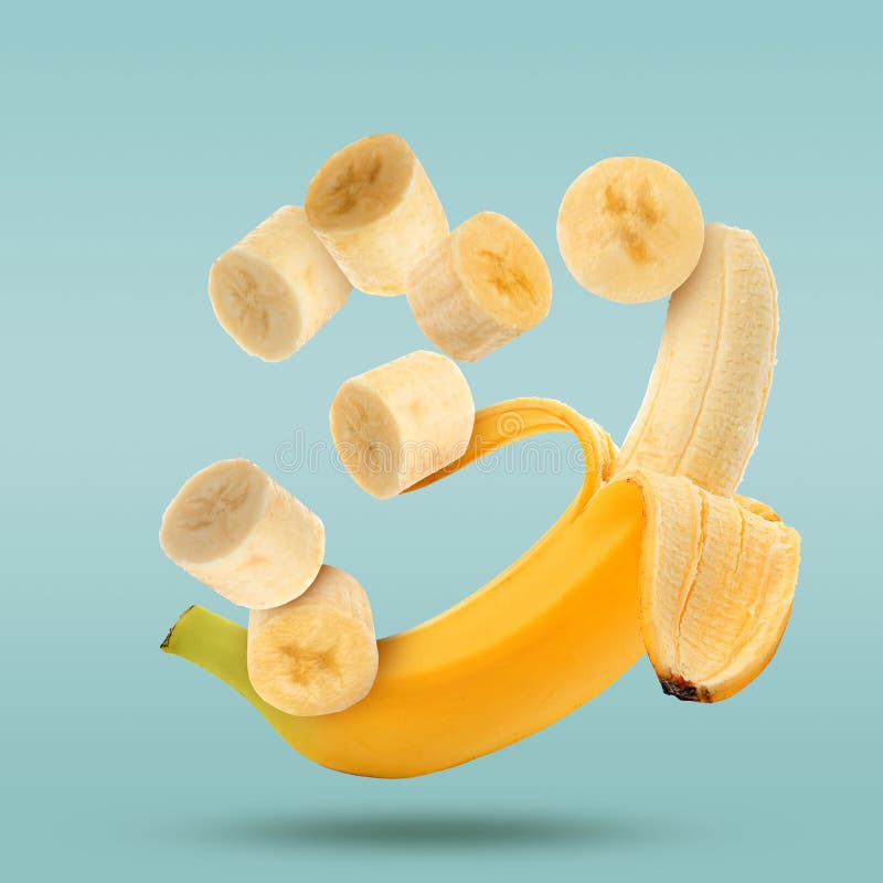 Fresh Ripe Bananas Falling Light Blue Background Stock Photos - Free ...