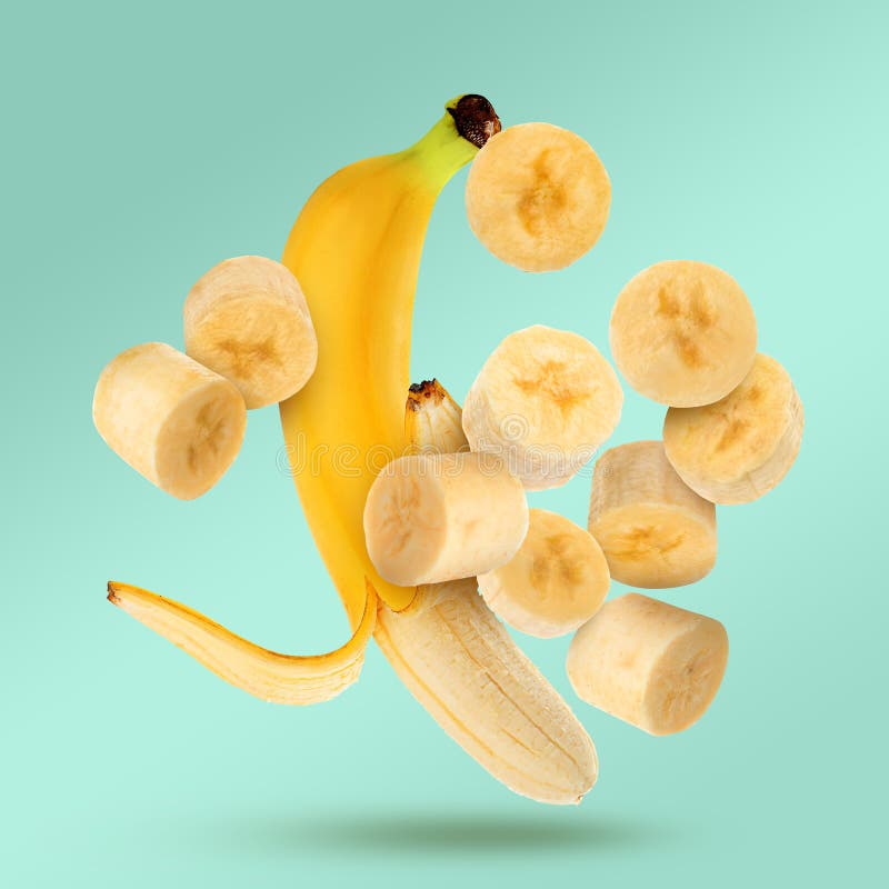 Fresh Ripe Bananas Falling on Turquoise Background Stock Image - Image ...