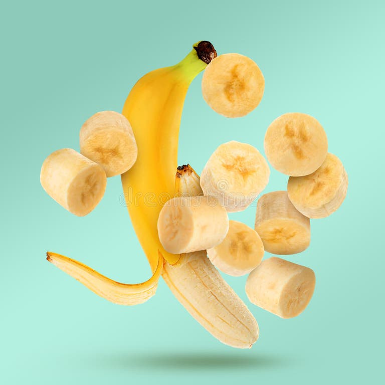 Fresh Ripe Bananas Falling on Turquoise Background Stock Image - Image ...