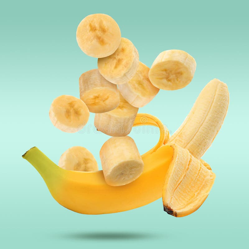 Fresh Ripe Bananas Falling on Turquoise Background Stock Photo - Image ...