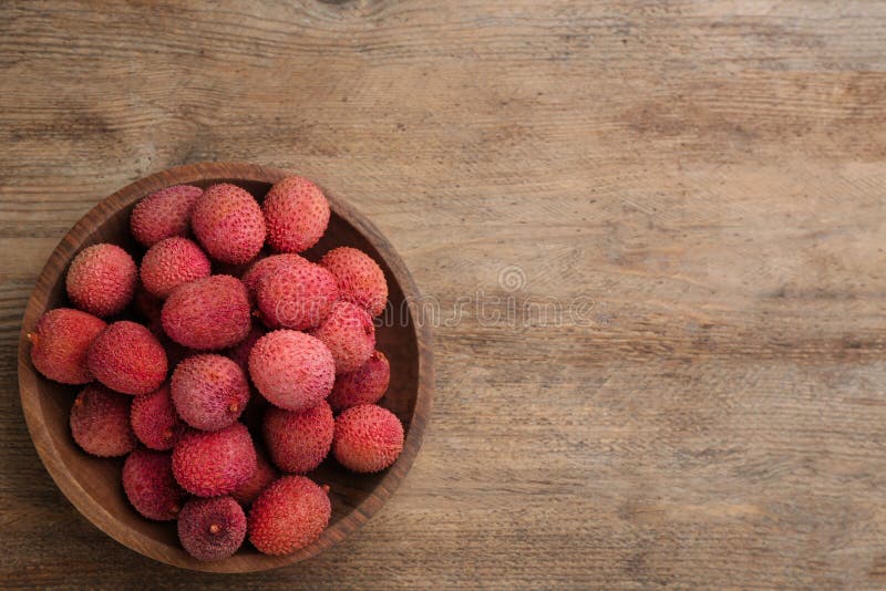Fresh Ripe Lychees on Wooden Table Top View. Space for Text Stock Photo ...