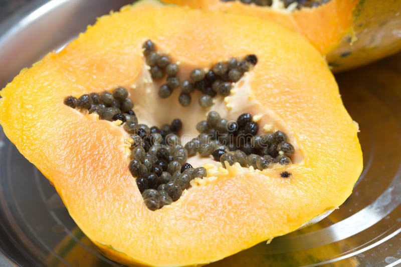 Fresh Ripe Papaya Cut on the Table Stock Photo - Image of kitchen, care ...
