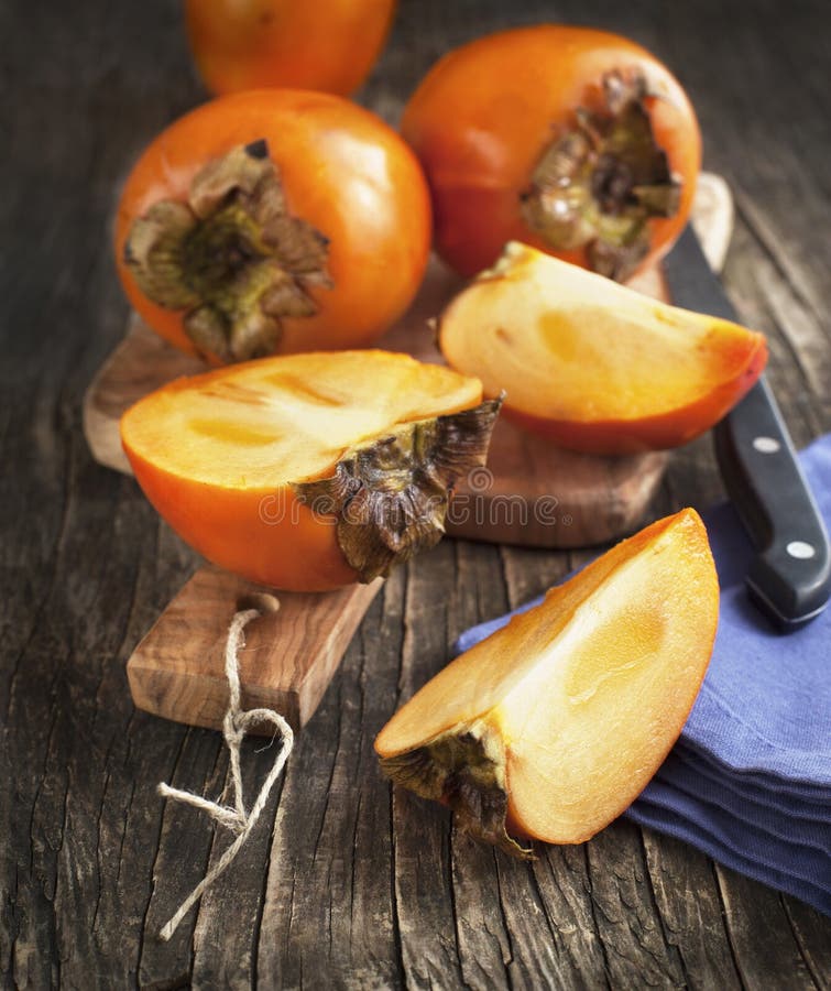 Fresh ripe persimmons stock photo. Image of eating, juicy - 37099232