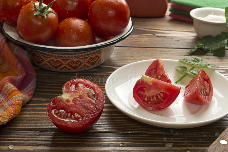 Fresh Ripe Tomatoes in Bowl, Half of Cutted Tomato Stock Image - Image ...