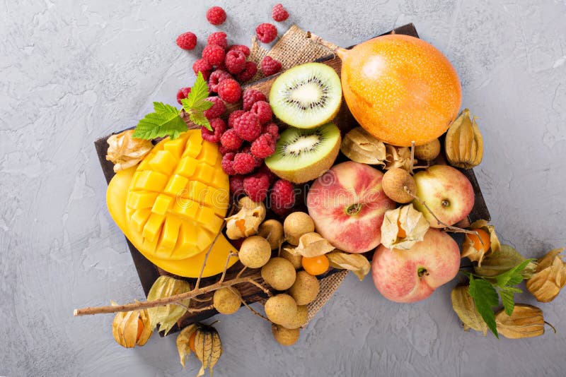 Fresh and Ripe Tropical Fruit Board Stock Photo - Image of closeup ...