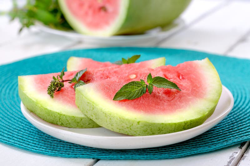 Fresh Ripe Watermelon on a Plate on the Table. Slices of Watermelon ...