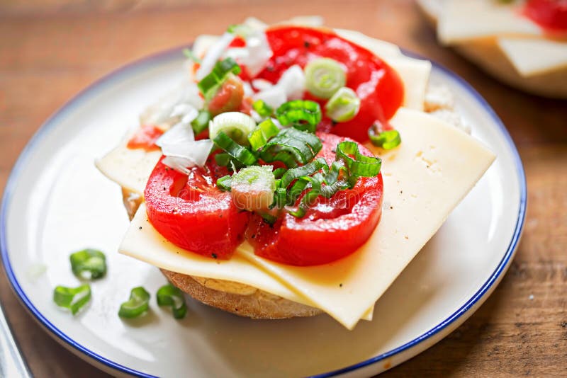 Fresh Roll with Cheese, Tomato and Sliced Spring Onion Stock Photo ...