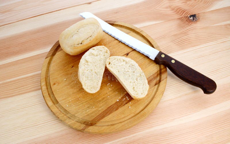 Fresh Rolls, Whole and Halved, with Bread Knife Stock Image - Image of ...