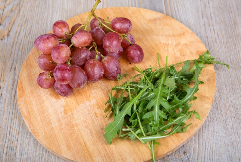 Fresh Rucola Salad with Red Grapes Stock Photo - Image of vegetables ...