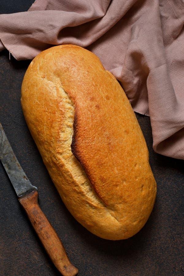Fresh, Ruddy Wheat Bread on a Rustic Concrete Background. Stock Photo ...