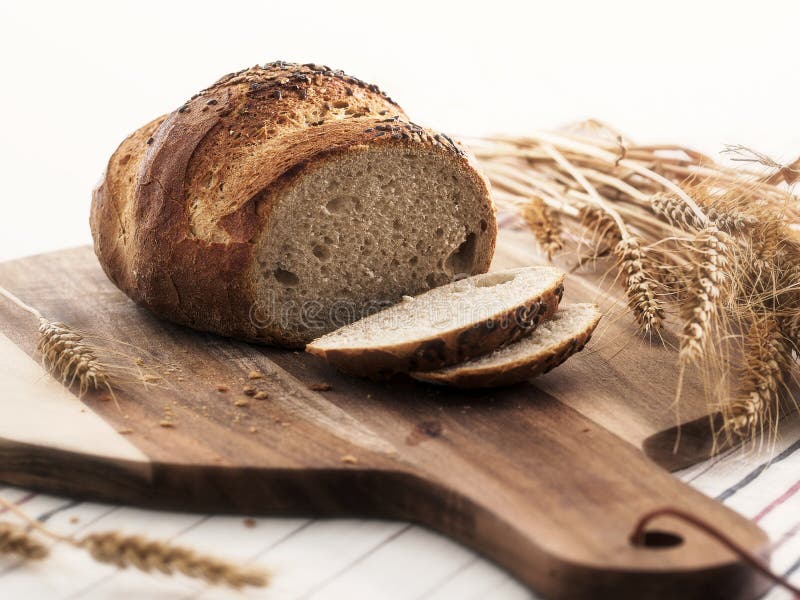 Fresh Rye bread on wood stock image. Image of goodness - 72585469