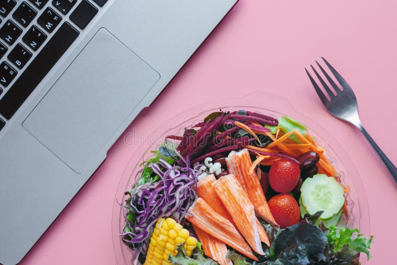 Fresh Salad Vegetables with Computer Laptop at Workplace Stock Image ...