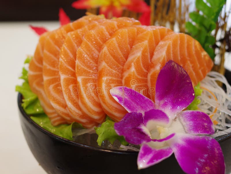 Salmon Sashimi with flower stock image. Image of sashimi - 113008135