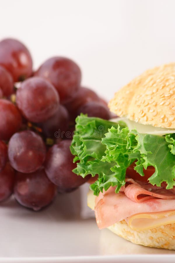 Fresh sandwich and grapes stock photo. Image of closeup - 4846196