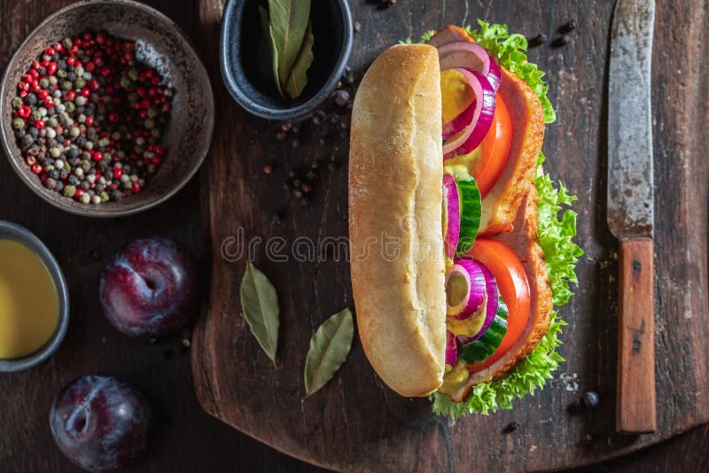 Fresh Sandwich Made of Pork Neck with Plums and Vegetables Stock Photo ...