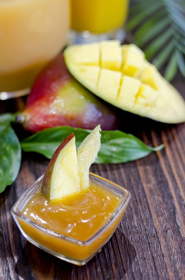 Fresh Sauce, Mango Fruit Dressing in a Glass Dish on the Table Close-up ...
