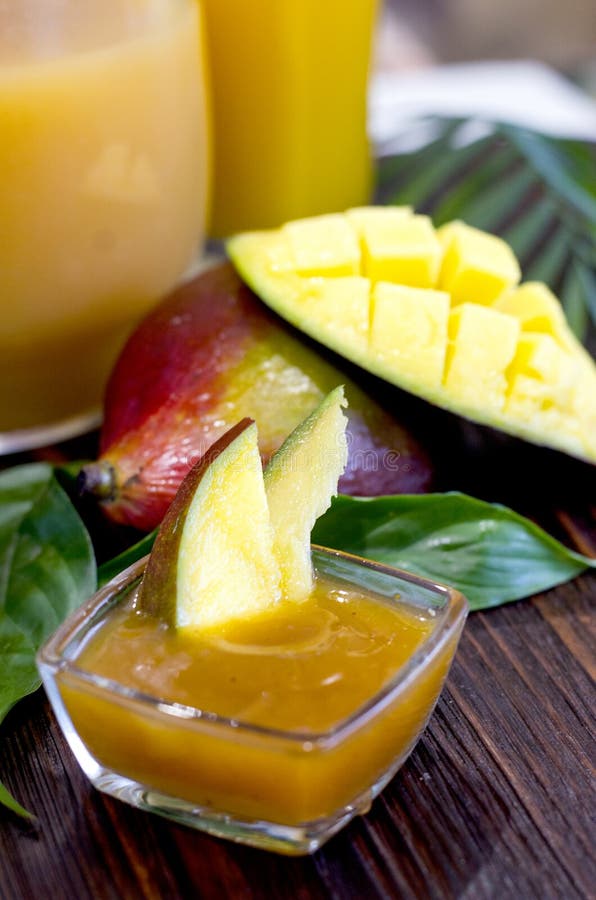 Fresh Sauce, Mango Fruit Dressing in a Glass Dish on the Table Close-up ...