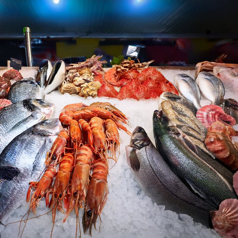 Fresh Seafood Display with a Variety of Fish and Shellfish on Crushed ...