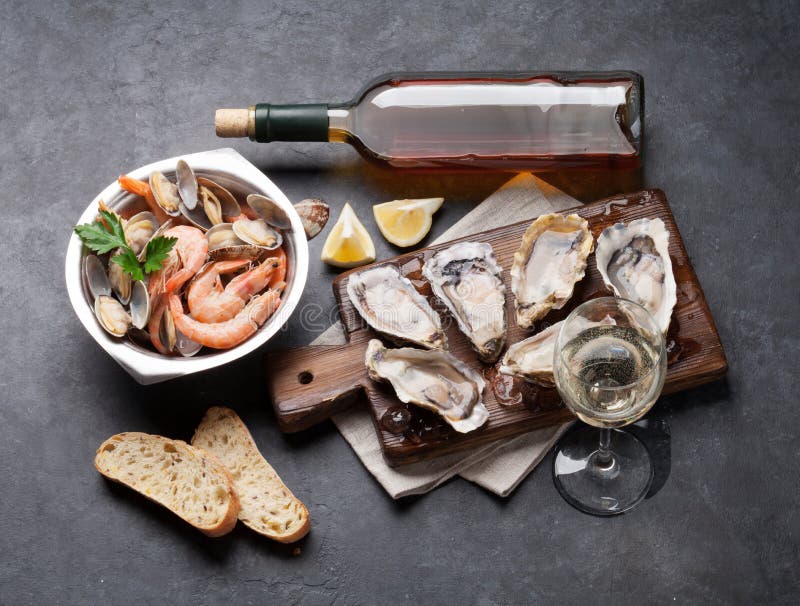Fresh Seafood and White Wine on Stone Table Stock Image - Image of ...