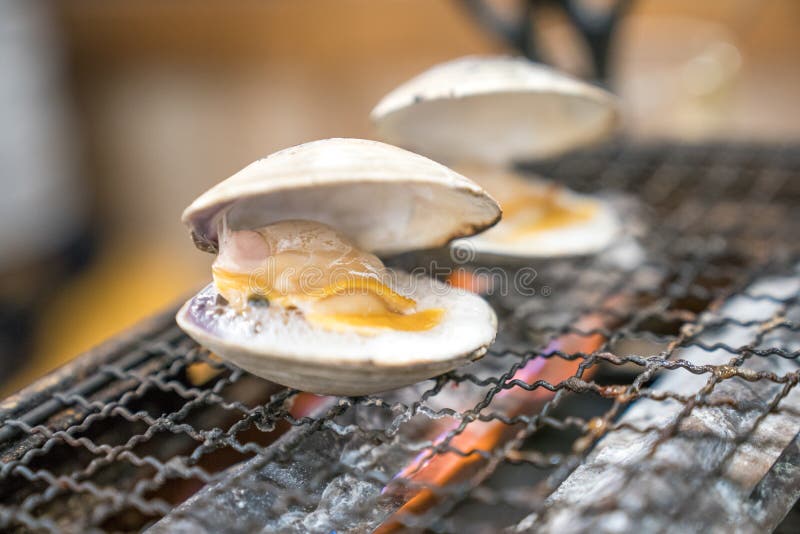 Fresh Shells are Grilled on Mini Strove, in Local Japanese Restaurant ...