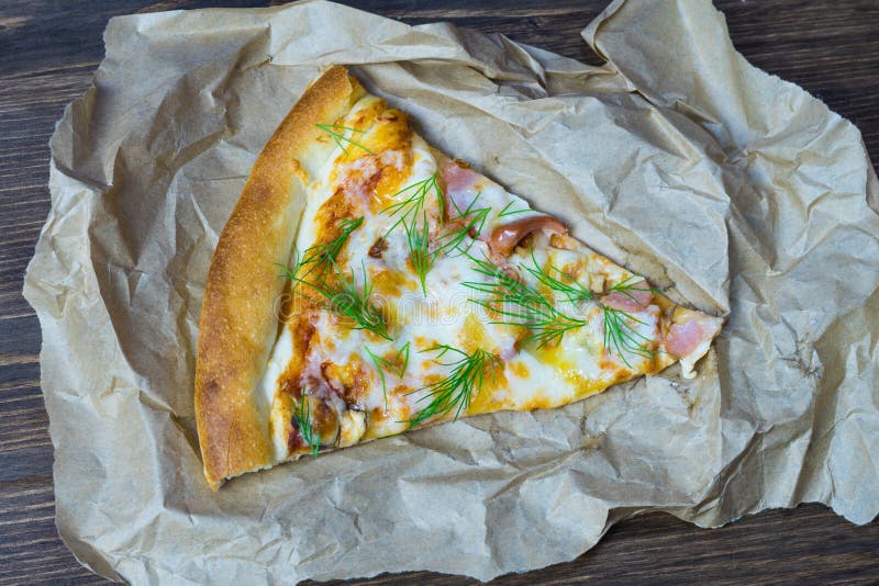 A Fresh Slice of Pizza on Paper. Stock Photo - Image of dinner, pepper ...