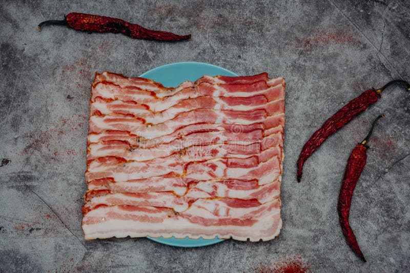 Fresh Sliced Bacon on a Gray Stone Background Stock Photo - Image of ...