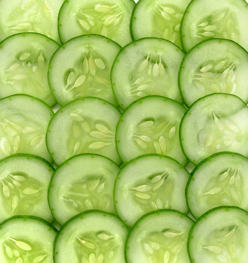 Fresh Sliced Cucumber on Background,Pieces of Fresh Cucumber. Stock ...